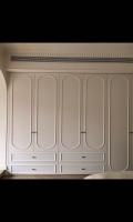 China French Cream Oval Recessed Panel Floor-To-Ceiling Wardrobe With Drawer Base for sale