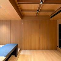 China Modern Minimalist Solid Wood Veneer Integrated Wall Panel & Concealed Full‑Height Cabinet for sale