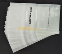 China 100% oxo biodegradable printed die cut handle plastic clothes bag and 50 micron clothes plastic carry packaging bag logo for sale