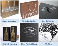 China Luxury Matte Black Shopping Paper Bag UV Clothing Packaging for sale