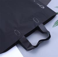 China soft loop plastic carry bags/soft plastic bags made in Vietnam,waterproof die cut handle plastic corn starch based biode for sale