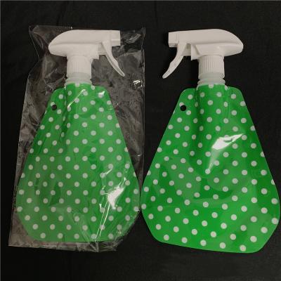 China Multifunctional rotating water spray spray water bag environmental protection foldable plastic water trigger pouch for sale