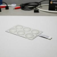 China Dome Retainer 005PET Flexible Membrane Keyboard 5 Keypads Suitable for Various Electronic and Industrial Applications for sale
