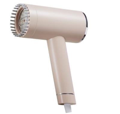 China Compact Travel Garment Steamer with Hair Brush Accessory Product Size 23.25x17x7.4 cm for sale