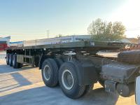 China 3axles Flatbed Truck Semi Trailer 60 Tons 20/40FT Container Shipping for sale