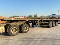 China 3 Axles Flatbed Transport Truck Semi Trailer 40FT Container for sale