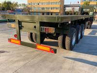 China 3 Axles Flatbed Semi Truck Trailer 40FT Container Transport Platform for sale