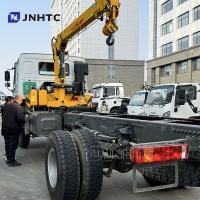 China SINOTRUK HOWO Diesel Cargo Truck 4x4 6 Wheeler Chassis With Crane Low Price for sale