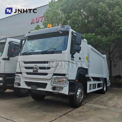 China HOWO Garbage Truck Compactor 4x2 Euro 2 Waste Disposal Garbage Rear Loader Truck Green Diesel  Model New for sale
