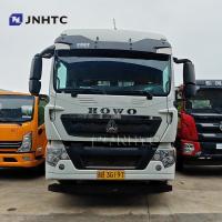 China HOWO 8X4 350HP 12 Wheel Dump Truck Chassis With Synchronous Gravel Sealing Truck for sale