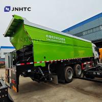 China HOWO 8X4 350HP 12 Wheel Dump Truck Chassis With Synchronous Gravel Sealing Truck for sale
