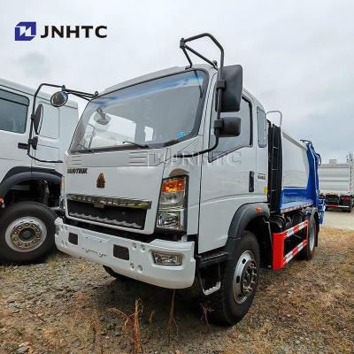 China NEW HOWO Garbage Truck 4X2 5CBM 105CBM Garbage Trash Compactor Garbage Truck for sale