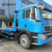China Howo TX Wrecker Truck  4x2 6 Wheels 3 Ton Flatbed Car Carrier Wrecker Diesel Fuel Tow Truck for sale