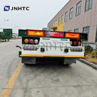 China 3 Axles 40tons Flatbed Semi Trailer 20ft 40ft Containers for sale