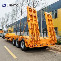 China Heavy Duty 60 80 Tons Lowbed Truck Semi Trailer With Leaf Spring Suspension System And Water Function for sale