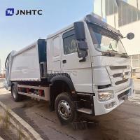 China Sinotruk Howo 4X2 300 HP Euro II Right Drive Garbage Collector Compressed Truck Waste Collection Truck for sale