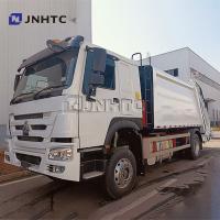 China Sinotruk Howo 4X2 300 HP Euro II Right Drive Garbage Collector Compressed Truck Waste Collection Truck for sale