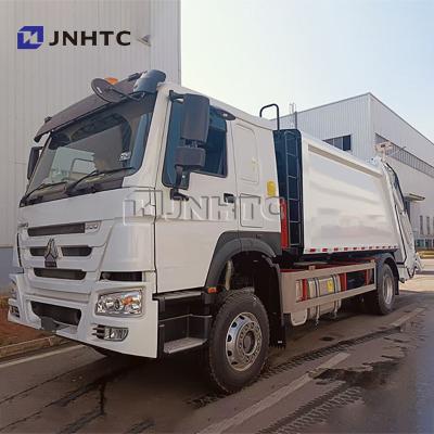 China Sinotruk Howo 4X2 300 HP Euro II Right Drive Garbage Collector Compressed Truck Waste Collection Truck for sale
