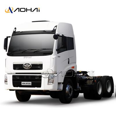 China New FAW J5P 6x4 Euro 2 Tractor Truck Automatic Transmission Air Suspension Left High Top Wraparound Trailer Head Truck Skylight for sale