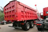 China SINOTRUK SWZ 8x4 Sand Tipper Truck Special In Red Color HF12 Front Axles For 55 Ton for sale