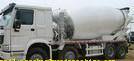 China 16cbm 8x4 Sinotruk HOWO Concrete Mixer Truck Red White Color 20-60 Ton CCC Passed for sale