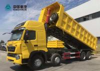 China 420HP 8X4 29CBM T7H Sinotruk Howo Dump Truck Yellow for sale