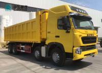 China 420HP 8X4 29CBM T7H Sinotruk Howo Dump Truck Yellow for sale