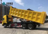 China 420HP 8X4 29CBM T7H Sinotruk Howo Dump Truck Yellow for sale