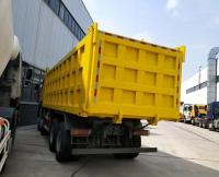 China HOWO 8x4 Heavy Duty Dump Truck , LHD Sinotruk Tipper Truck Yellow Color for sale