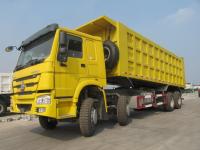 China HOWO 8x4 Heavy Duty Dump Truck , LHD Sinotruk Tipper Truck Yellow Color for sale