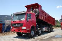 China Stock Howo 371hp 8x4 Heavy Duty Dump Truck For Promotion In Red Color for sale