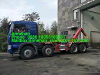 China Hook Arm Sinotruk Howo7 6x4 Euro2 Garbage Compactor Truck for sale
