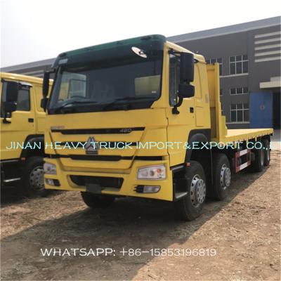 China Sinotruk Howo 40 Ft 30 Ton Flatbed Cargo Truck With Container Lock for sale