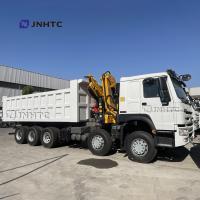 China Howo 16 Wheeler Dump Truck With 10T Foldable Arm Crane With Lifting Axle for sale