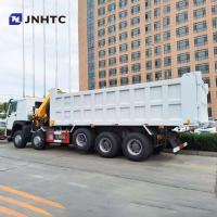 China Howo 16 Wheeler Dump Truck With 10T Foldable Arm Crane With Lifting Axle for sale