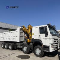 China Howo 16 Wheeler Dump Truck With 10T Foldable Arm Crane With Lifting Axle for sale