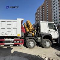 China Howo 16 Wheeler Dump Truck With 10T Foldable Arm Crane With Lifting Axle for sale