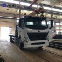 China 25 Tons Sinotruk HOWO A7 Flatbed Tow Truck 0 Degree Wrecker Towing Truck for sale