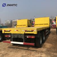 China SINOTRUK Howo Heavy Cargo Truck 35 Tones Flatbed Trailer Tri Axle Flatbed for sale