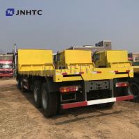 China SINOTRUK 8*4 22-30 Ton Concave Flatbed Transport Truck Excavator Transport Truck for sale