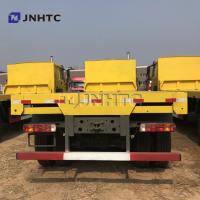 China SINOTRUK 8*4 22-30 Ton Concave Flatbed Transport Truck Excavator Transport Truck for sale