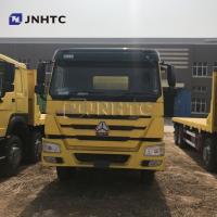 China SINOTRUK 8*4 22-30 Ton Concave Flatbed Transport Truck Excavator Transport Truck for sale