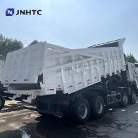 China Front Lifting Heavy Duty Dump Truck 12 wheels With Rear Cover Sinotruk Howo for sale
