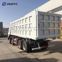 China Sinotruk Howo Benz White Dump Truck 50T 12 wheels Right Hand Drive New Model for sale
