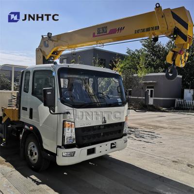 China SINOTRUK HOWO 4X2 Light Duty Commercial Trucks With CRANE RHD 10 Ton Truck for sale