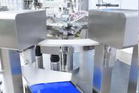 China Rotary Vacuum Packaging Machine High-Speed Production with Multiple Stations and Vacuum Chambers for Increased Efficiency for sale