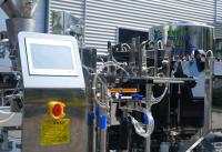China Rotary Premade Pouch Packing Machine for M-shaped Bags with Siemens PLC Control and Stainless Steel Frame for sale