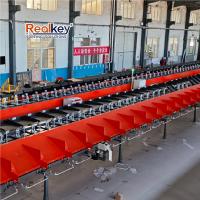 China High Precision Tilt Tray Sorter with 99.99% Accuracy and 7200-10800 P/h Capacity for Intelligent Sorting for sale