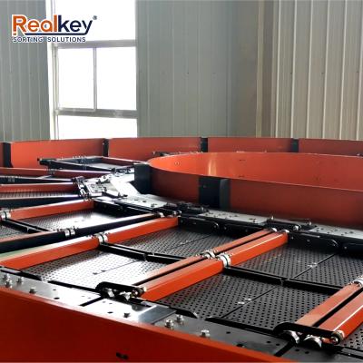 China Space Saving Compact Split Tray Sorter Small Footprint Design, Dense Sortation for Limited Warehouse Space for sale