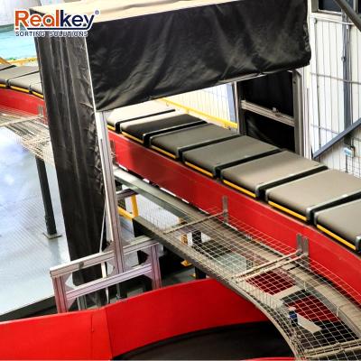 China Stainless Steel Cross Belt Sorter with Up to 22,000 Items per Hour and Compact Footprint for Automated Sorting for sale